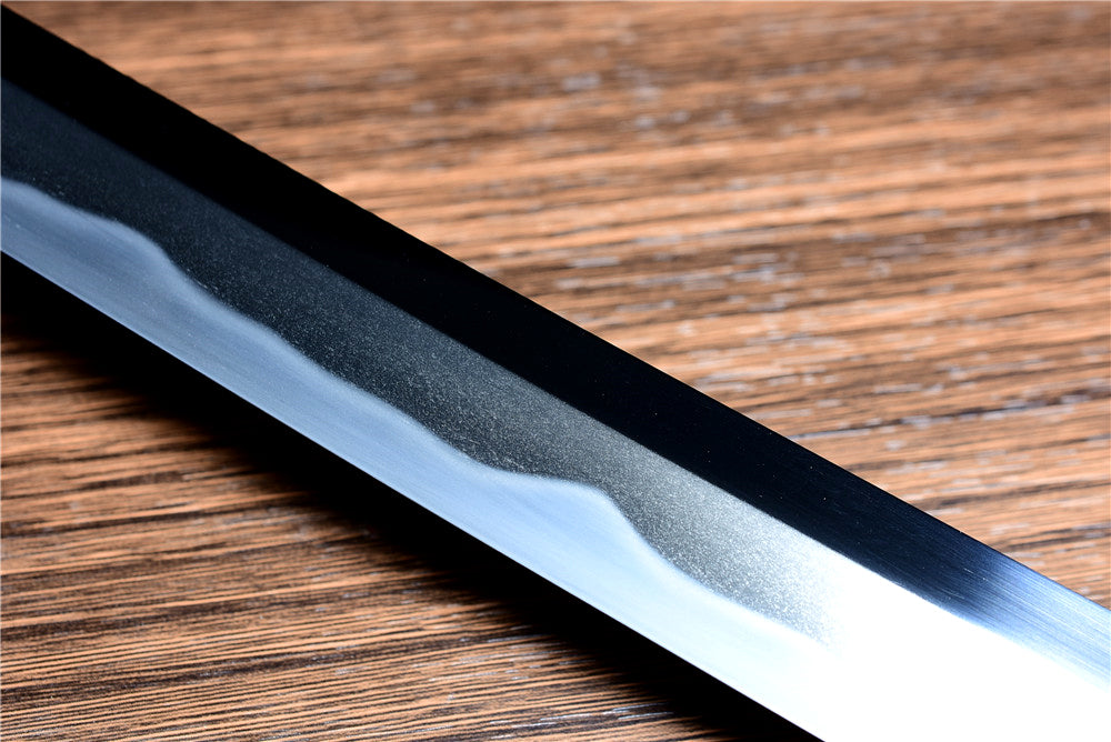 What is clay tempering in a katana?